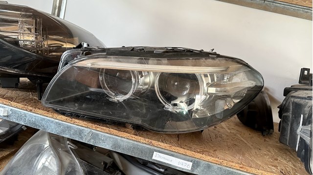 63117343911 BMW фара левая