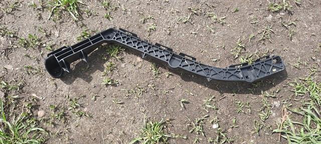 5215560100 Toyota кронштейн бампера заднего правый