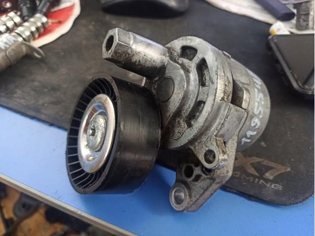 119554BA0A Nissan натяжитель приводного ремня