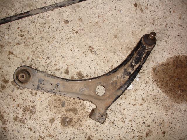 4013A009 Mitsubishi левый рычаг передней нижней подвески