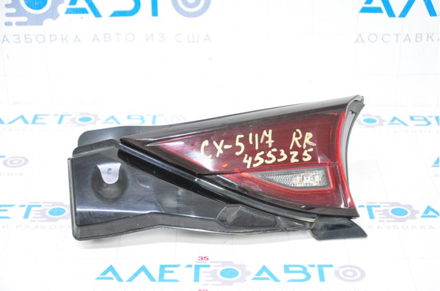 KB8A513F0A Mazda фонарь задний правый внутренний