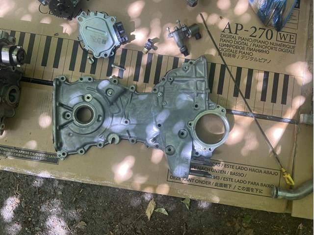 PYFA10500 Mazda крышка цепи двигателя