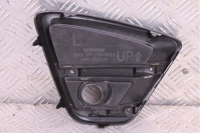 KA0H50C21A Mazda заглушка бампера переднього