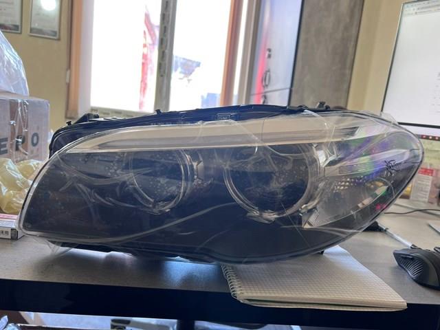 63117343911 BMW фара левая