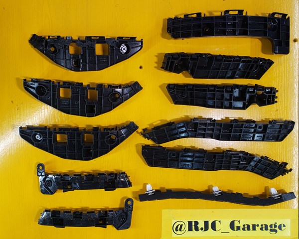 5215648030 Toyota Кронштейн бампера заднего левый