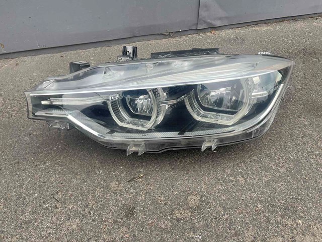 63117419629 BMW фара левая