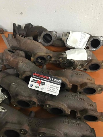 LR013133 Land Rover колектор випускной левий