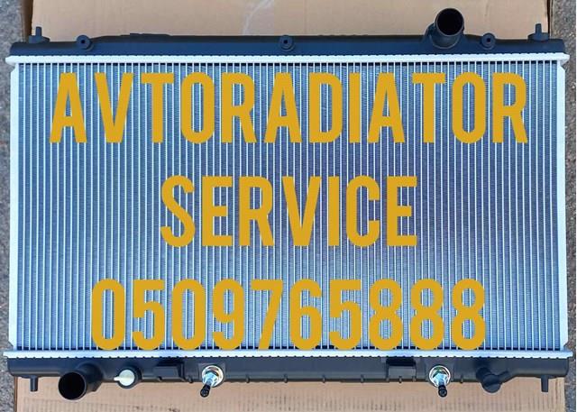 214604HK0A Nissan радиатор