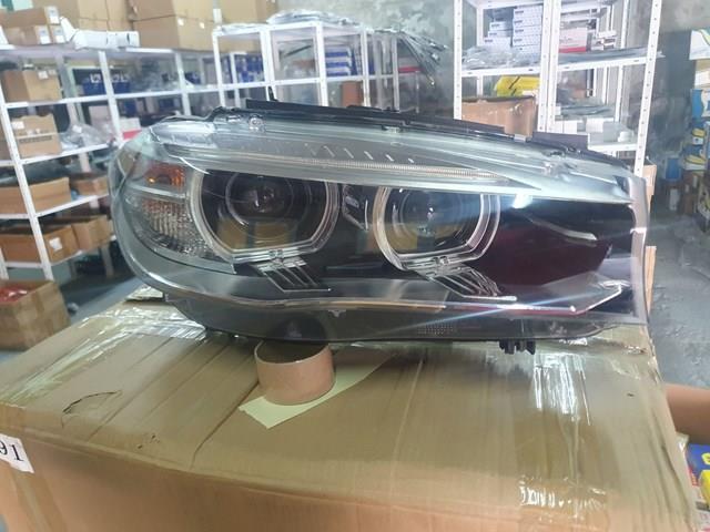 63117317110 BMW фара правая