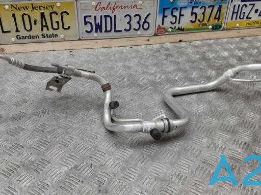 84341886 General Motors трубка кондиционера компрессор-печка вторая