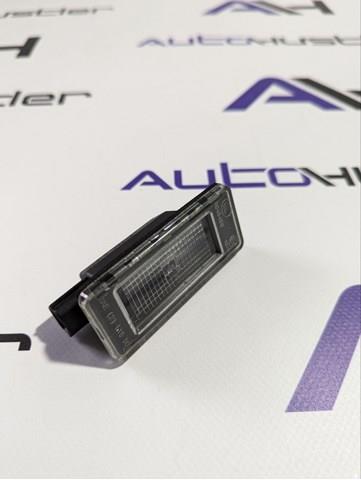 265108990E Nissan фонарь подсветки заднего номерного знака