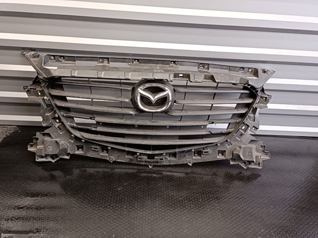 BANE50712D Mazda решетка радиатора