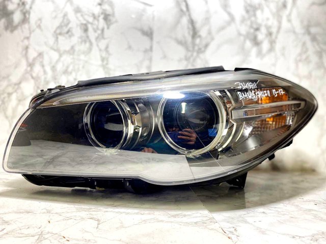 63117343911 BMW фара левая