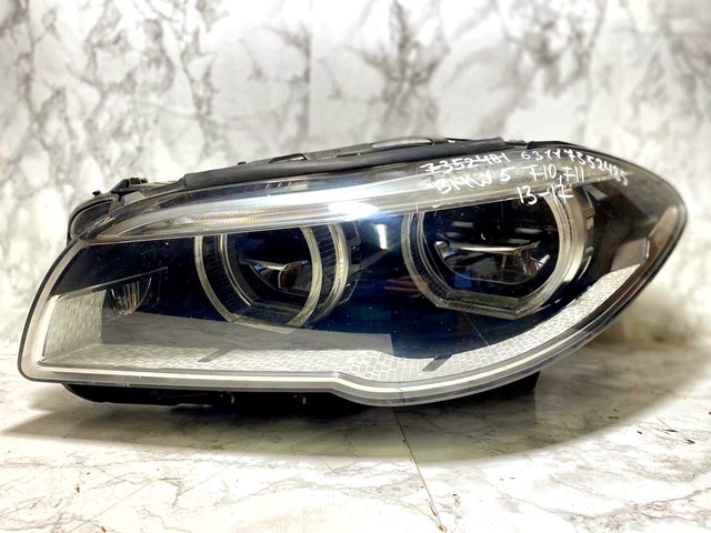 63117352485 BMW фара левая