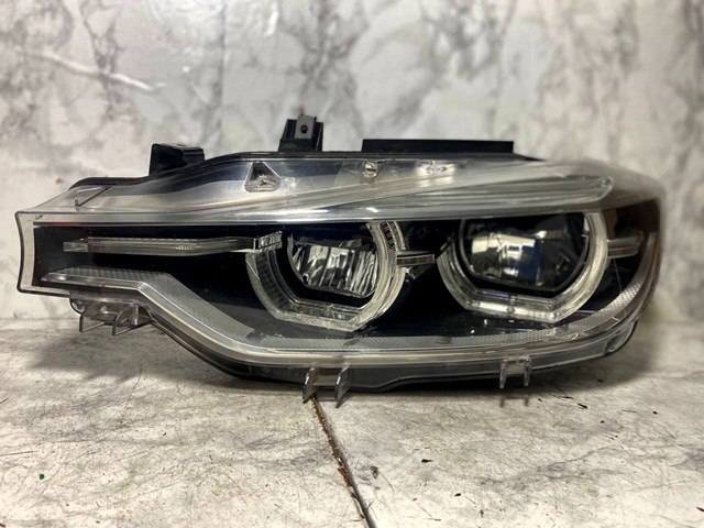 63117419633 BMW фара левая