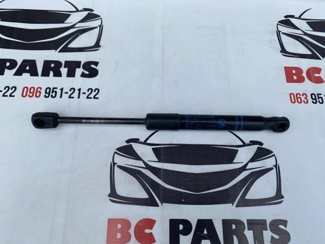 51237239233 BMW амортизатор капота