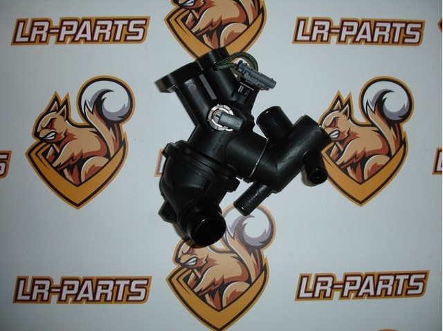 LR073694 Land Rover термостат