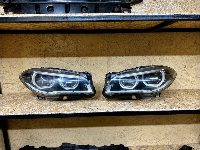63117352485 BMW фара левая