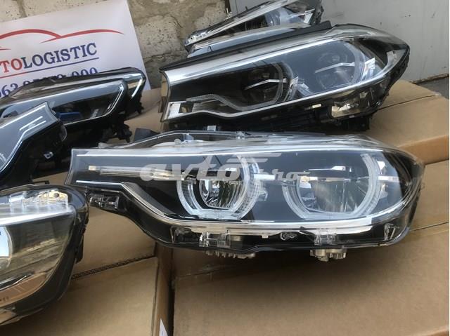 63117419633 BMW фара левая