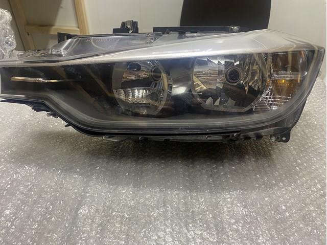 63117259523 BMW фара левая