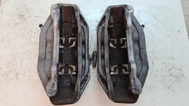 8W0615107F VAG Суппорт тормозной передний левый