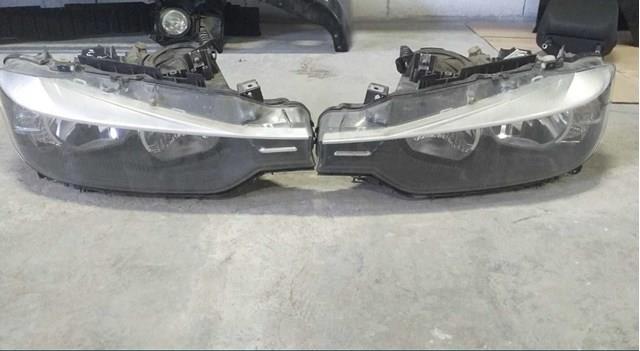 63117259523 BMW фара левая