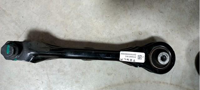 104442700C Tesla рычаг (тяга задней подвески продольный верхний