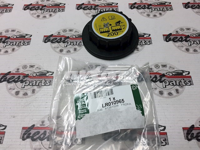 LR010965 Land Rover крышка (пробка расширительного бачка)