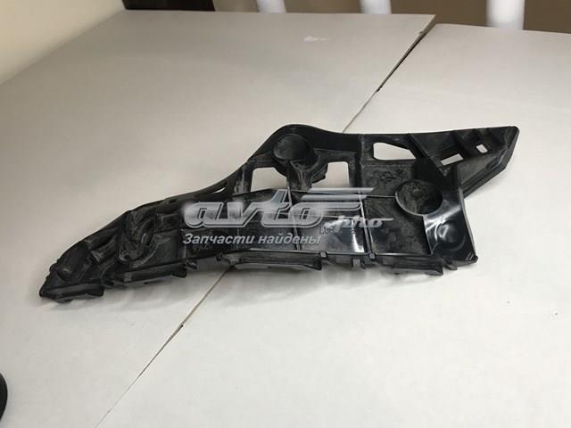 521460E060 Toyota кронштейн бампера переднего левый