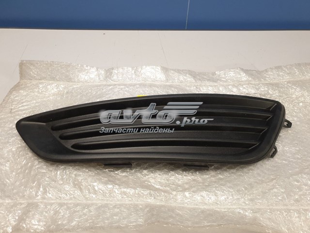 1865388 Ford решетка бампера переднего левая