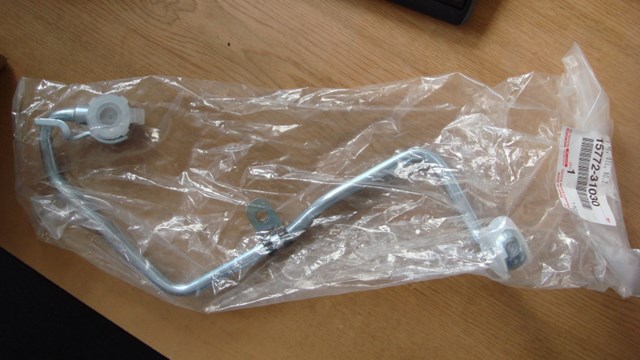 1577231030 Toyota Трубка (шланг) масляного радиатора, высокого давления