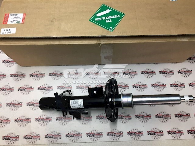 LR070932 Land Rover амортизатор передний левый