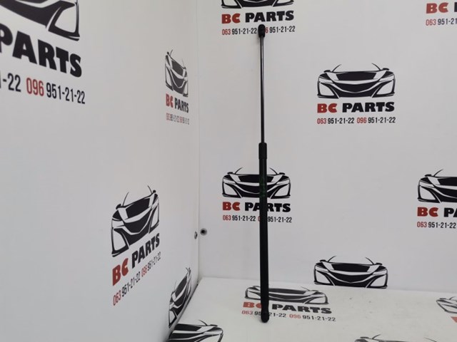 561823359 VAG Амортизатор капота