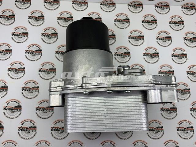 LR124259 Land Rover радиатор масляный (холодильник, под фильтром)