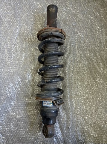 E61001LB7A Nissan амортизатор передний правый