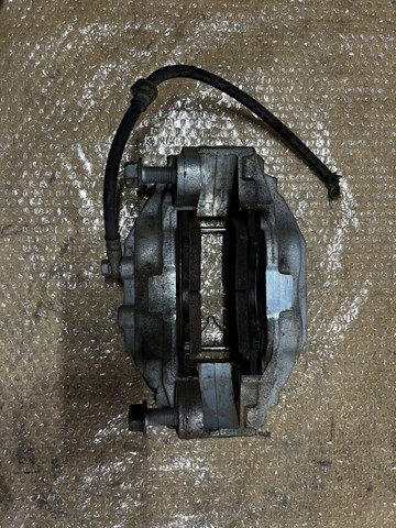 4775060320 Toyota Суппорт тормозной передний левый